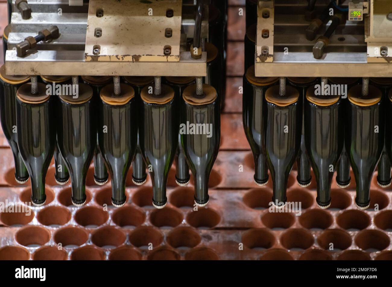 Production of cremant sparkling wine in Burgundy, France. Automatically ...