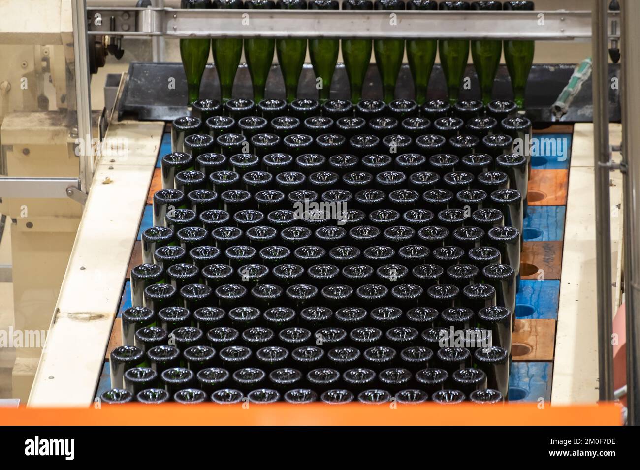 Production of cremant sparkling wine in Burgundy, France. Automatically ...