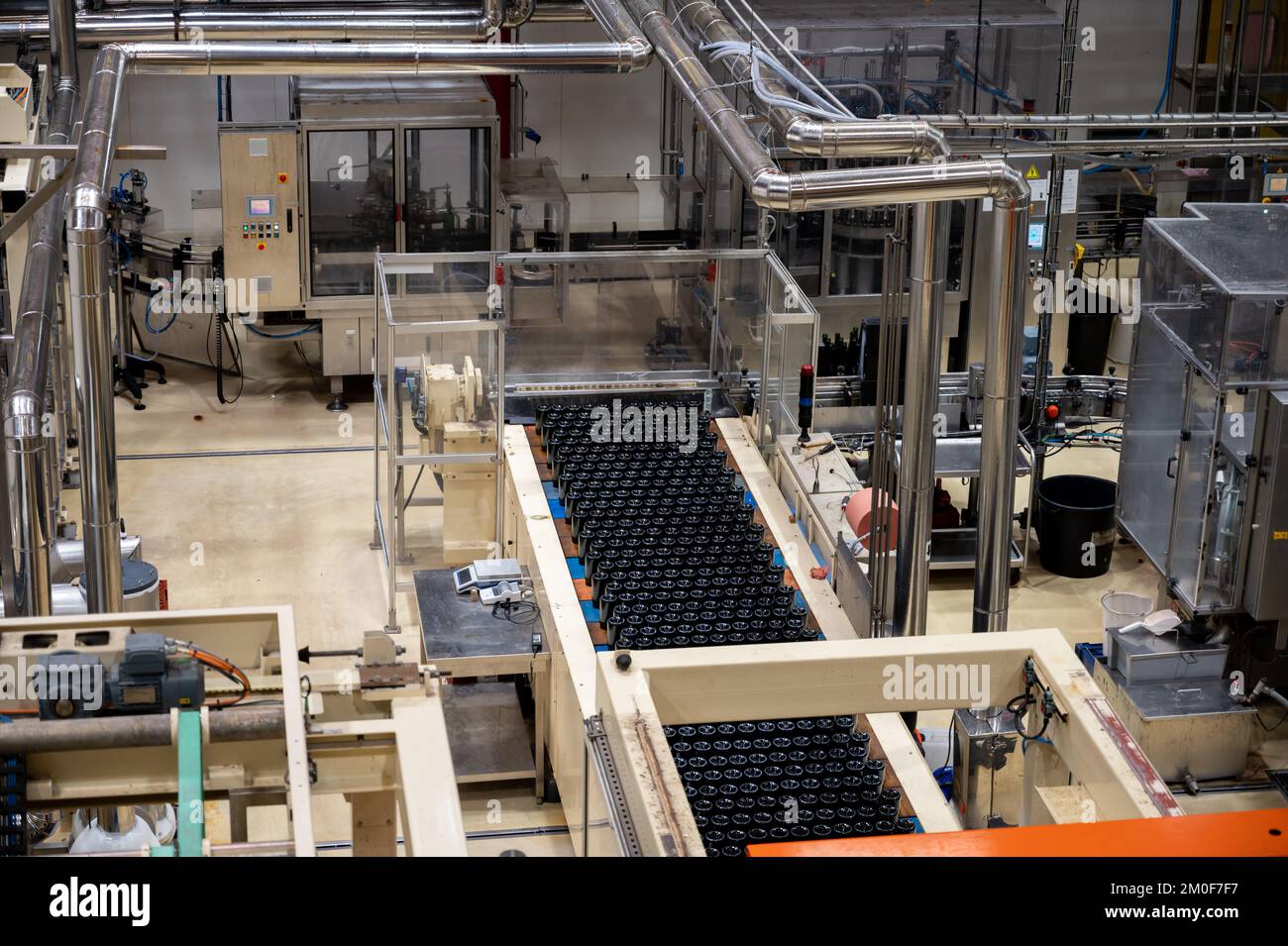 Production of cremant sparkling wine in Burgundy, France. Automatically ...