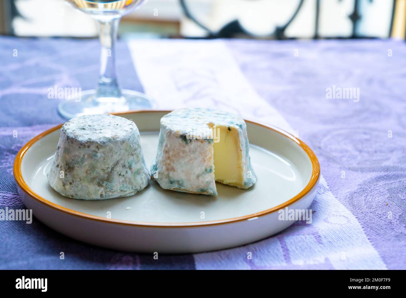 Small french goat cheeses, matured and with grey mold from Macon ...