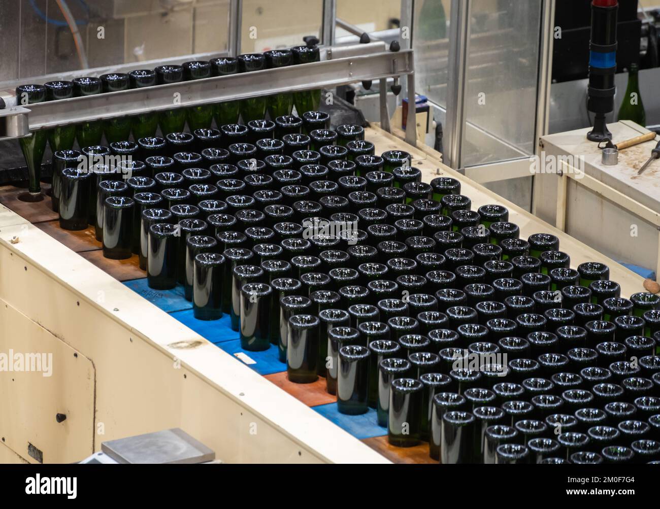 Production of cremant sparkling wine in Burgundy, France. Automatically ...