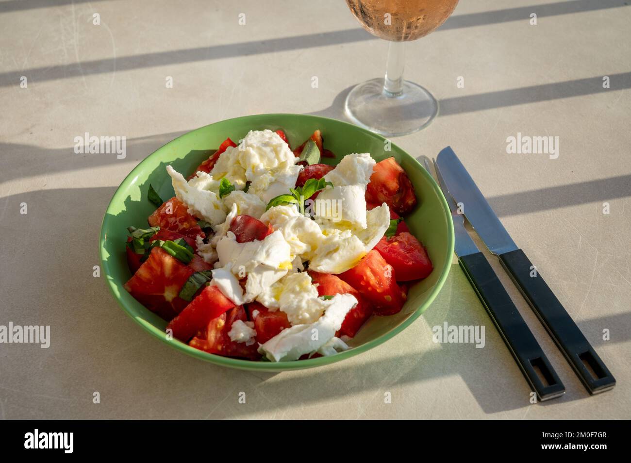 Itaian vegetarian food, fresh caprese salad made with white soft ...