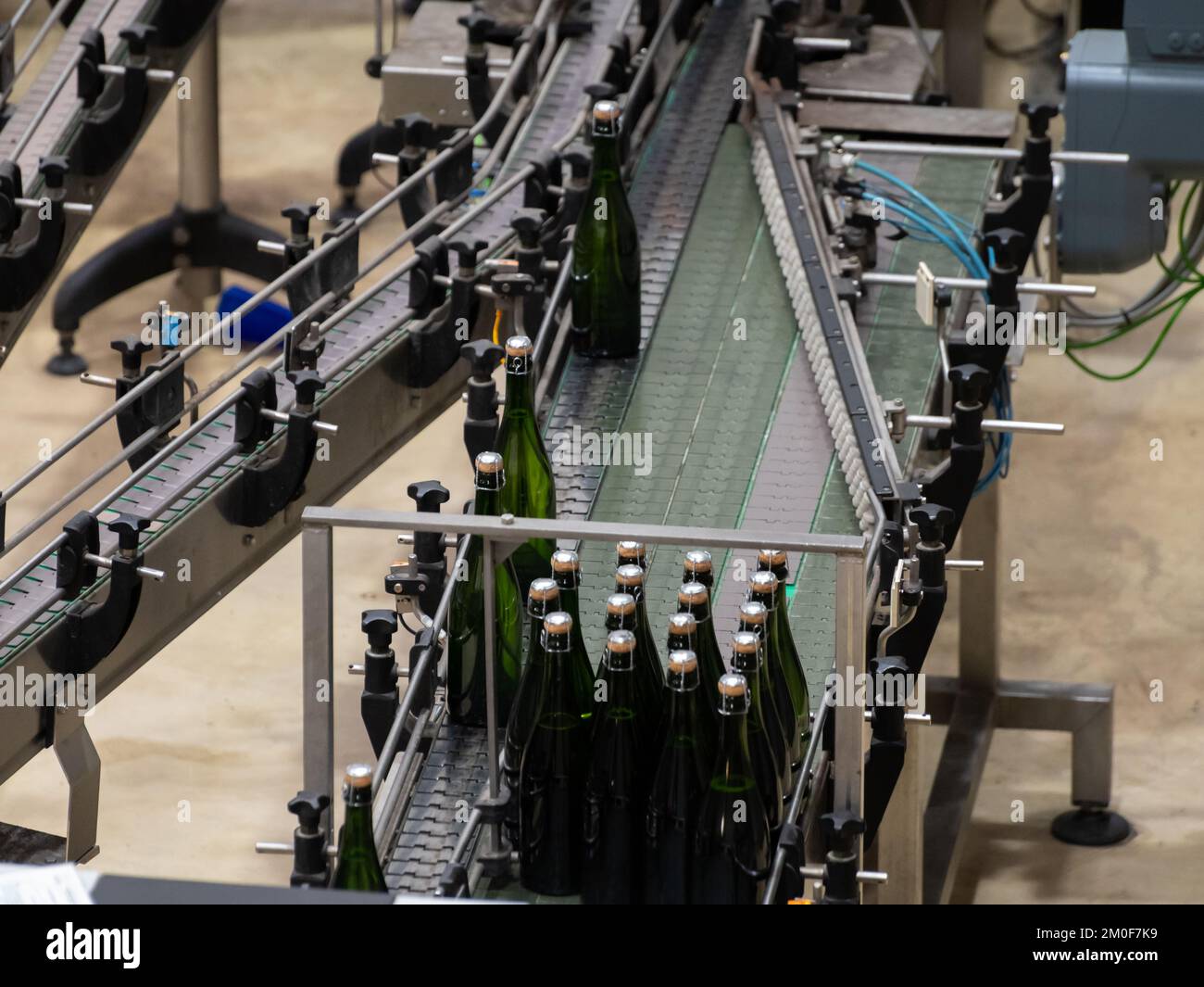 Production of cremant sparkling wine in Burgundy, France. Automatically ...