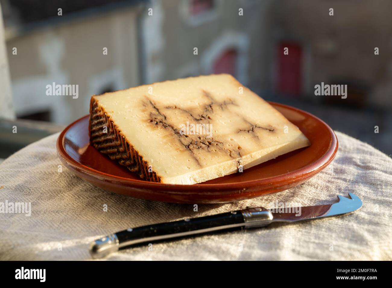 Collection of world cheeses, piece of matured Spanish Sheep Cheese with ...