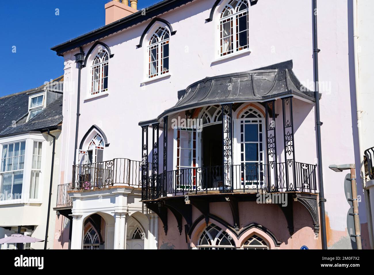 View of pretty balconies on a traditional building alongside the ...