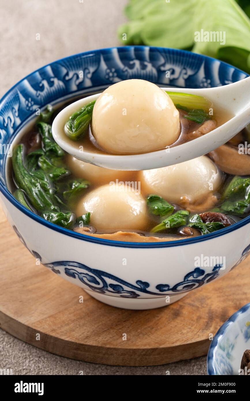 Eating big tangyuan yuanxiao (tang yuan, glutinous rice dumpling balls ...