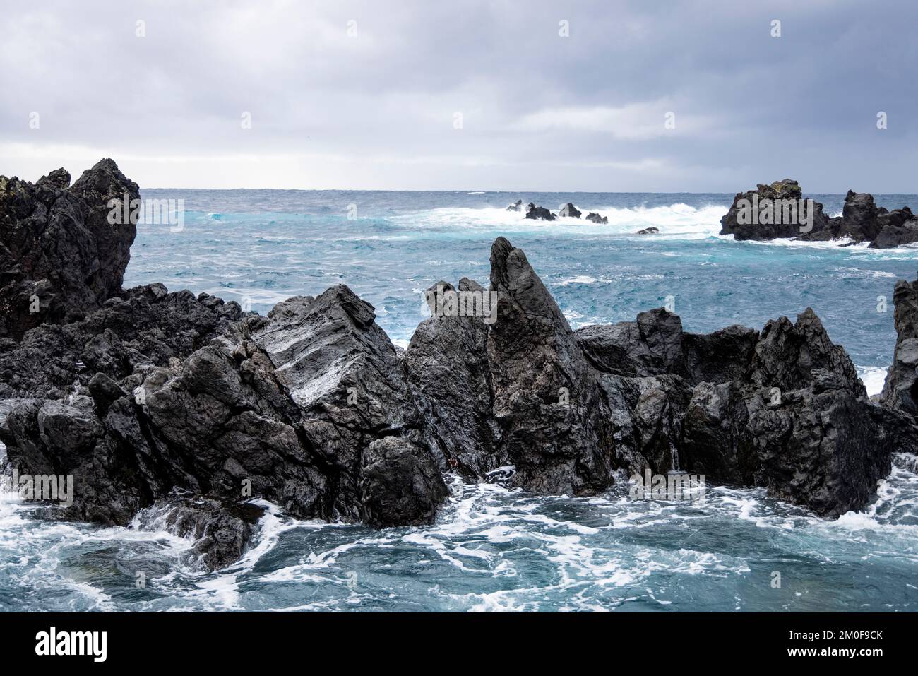 Sea with black lava rock in São Jorge, Azores Stock Photo - Alamy