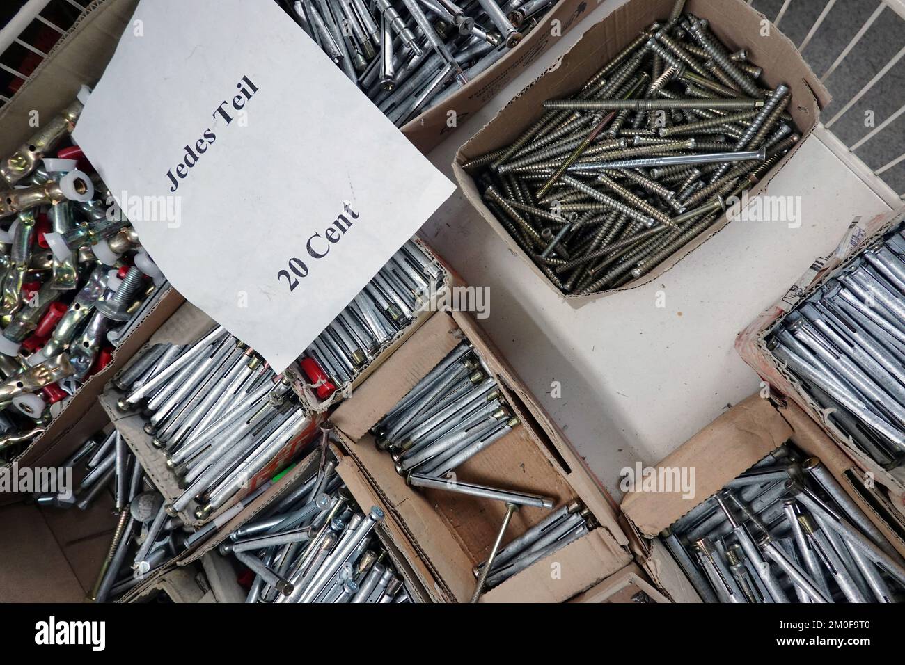 various screws and dowels as loose goods in a remnant market, Germany ...