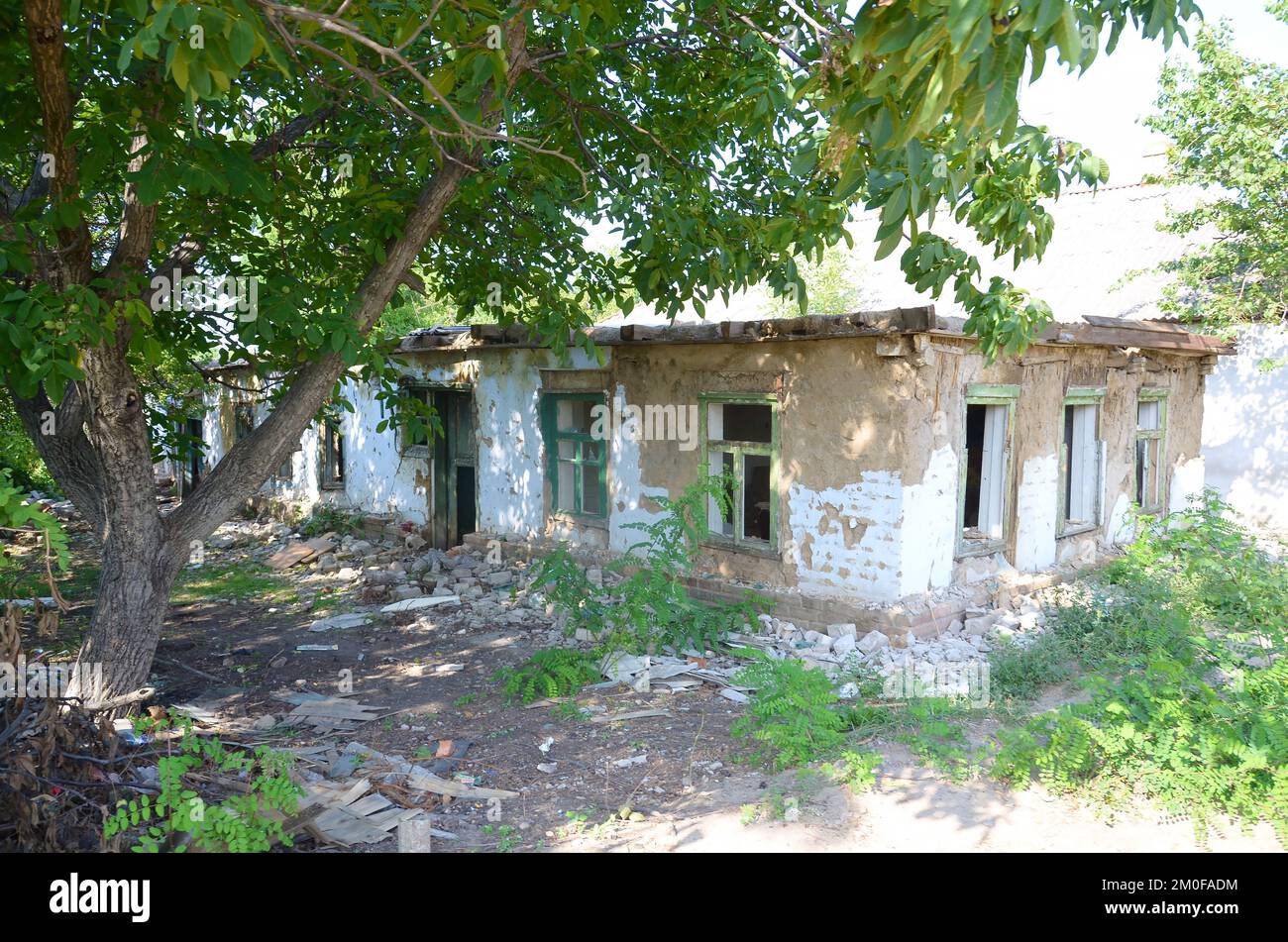 Collapsed industrial building in daytime. Disaster scene full of debris ...