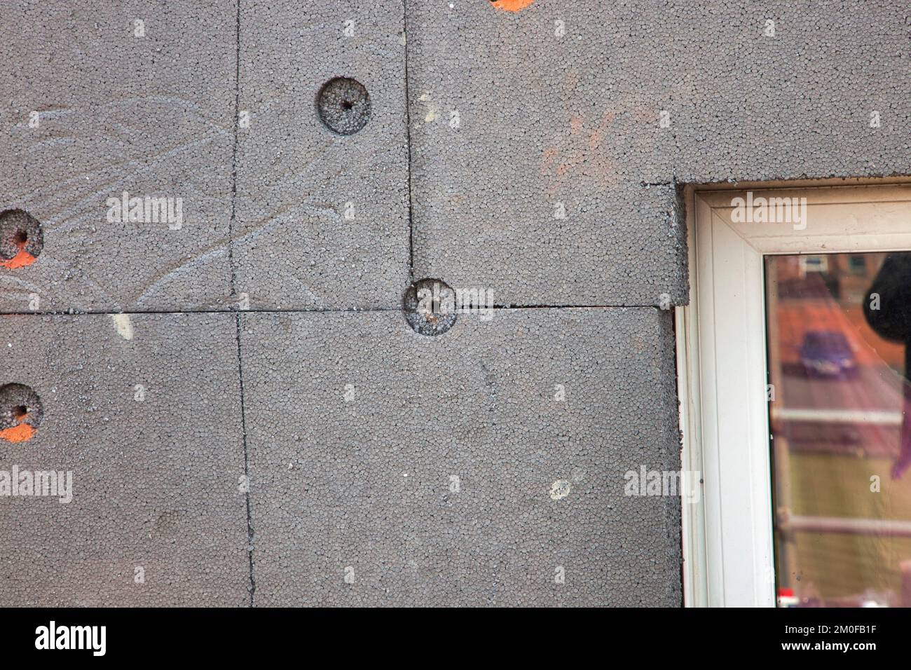 External wall Insulation anchor pin holes Stock Photo - Alamy