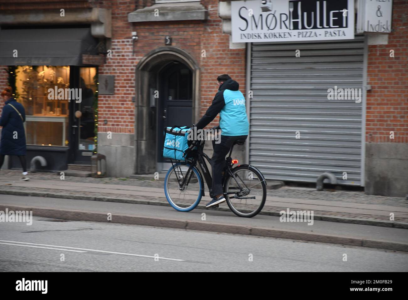 Copenhagen/Denmark/06 December 2022/Wolt partner delivert biker in ...
