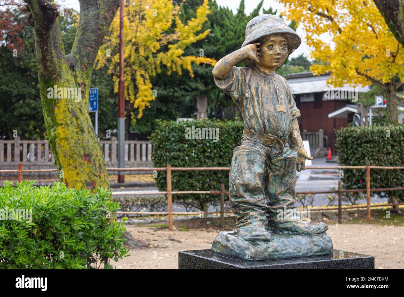 Himeji, Japan. Statue of a young boy in Otemae-dori Stock Photo - Alamy