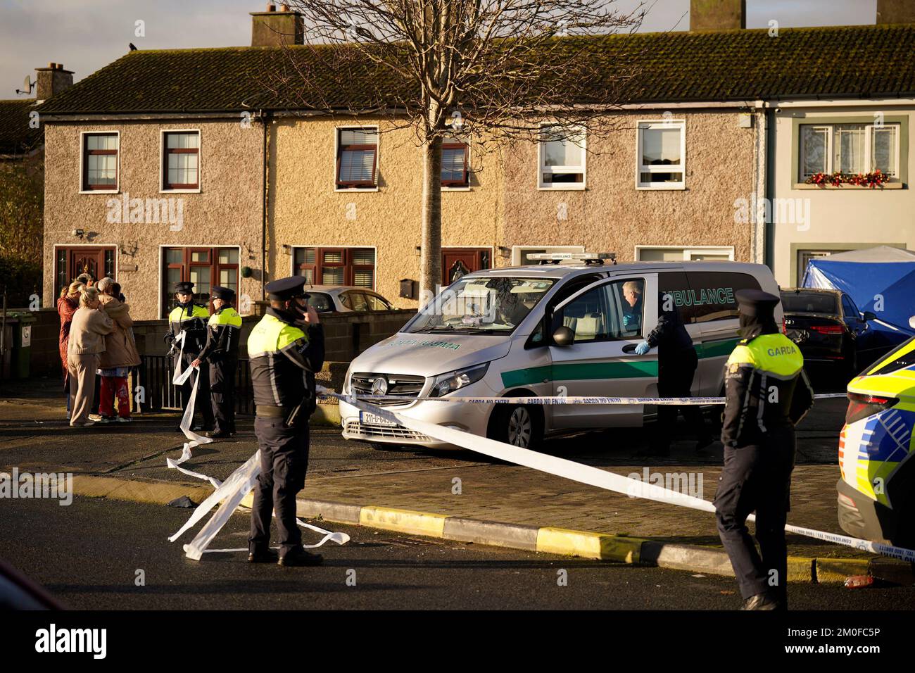 The body is removed from the scene in Ronanstown, Dublin, where a man ...