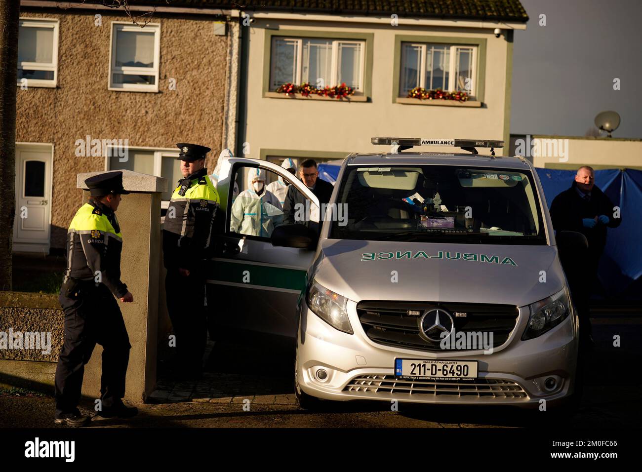 The body is removed from the scene in Ronanstown, Dublin, where a man ...