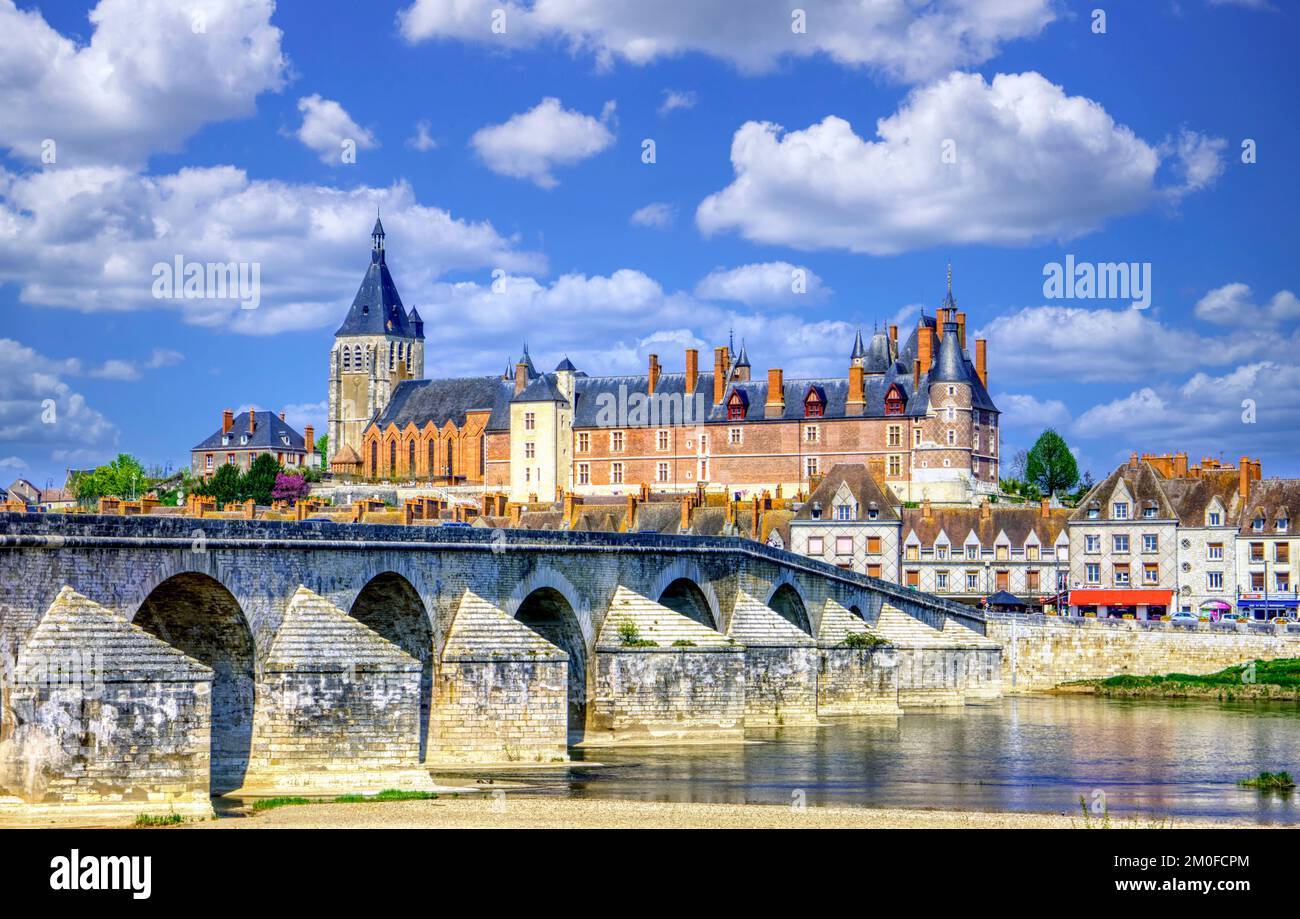 View of Gien with the castle and the old bridge across the Loire ...