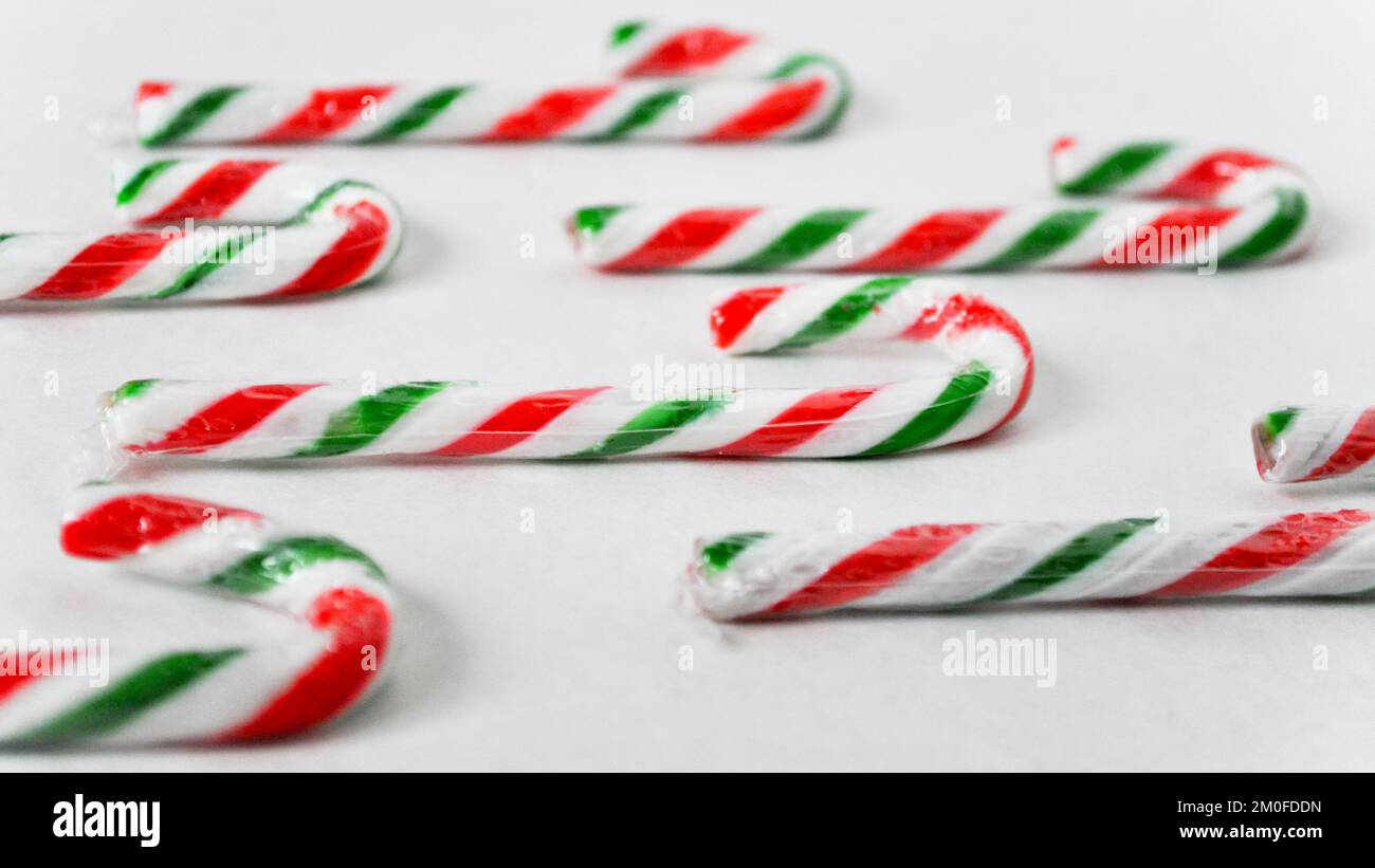Traditional Christmas candy canes set against a white background Stock ...