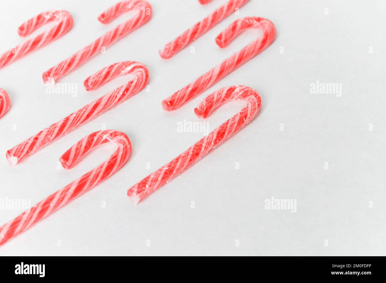 Traditional Christmas candy canes set against a white background Stock ...