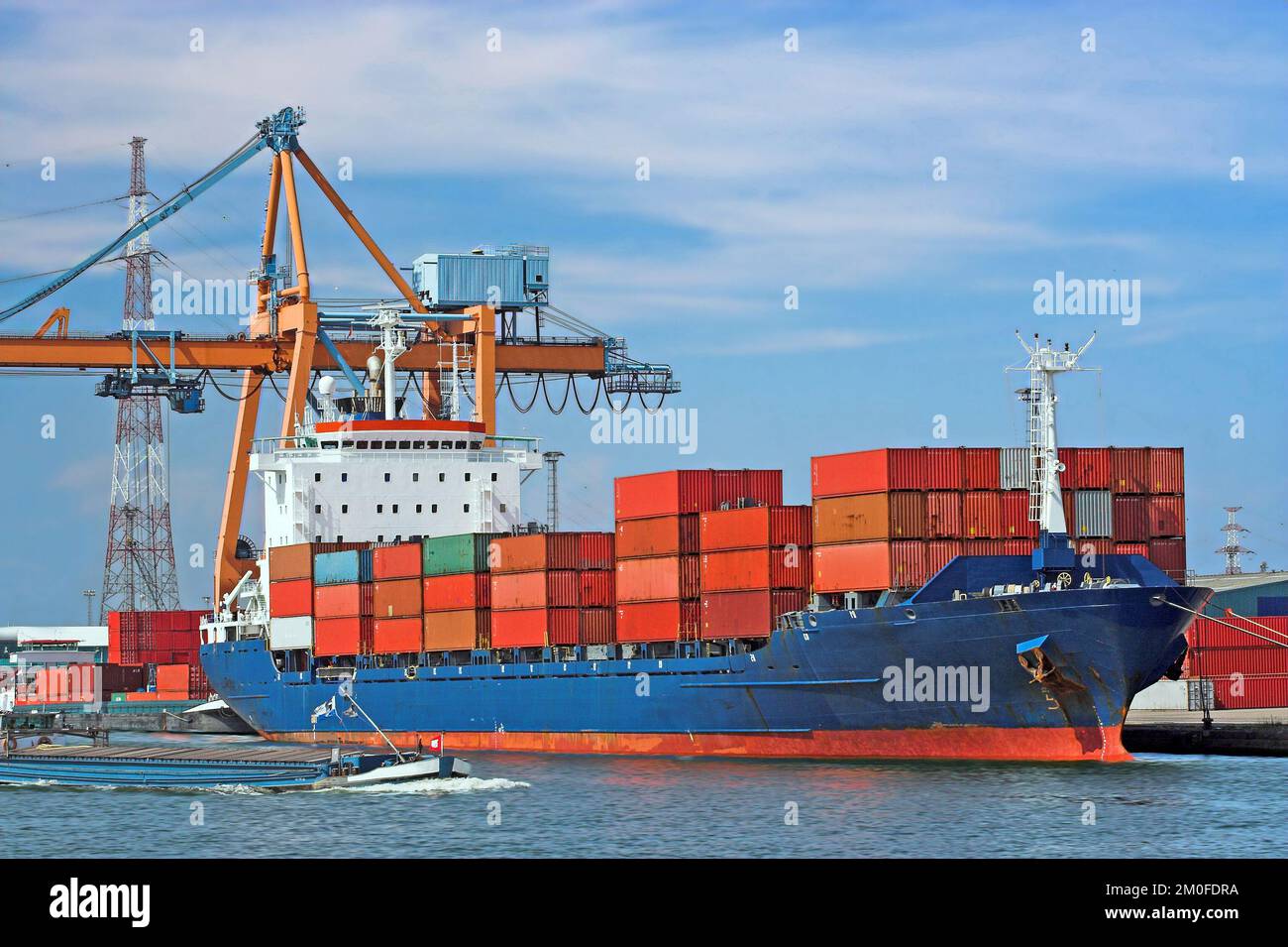 Loaded container ship at sea example Stock Photo - Alamy
