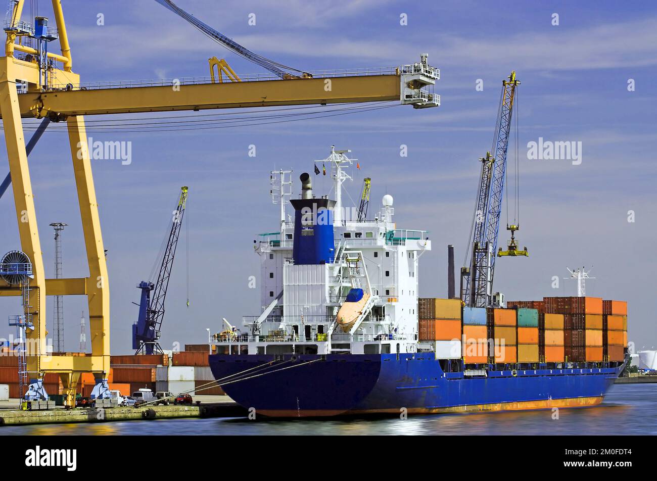 Loaded container ship at sea example Stock Photo - Alamy
