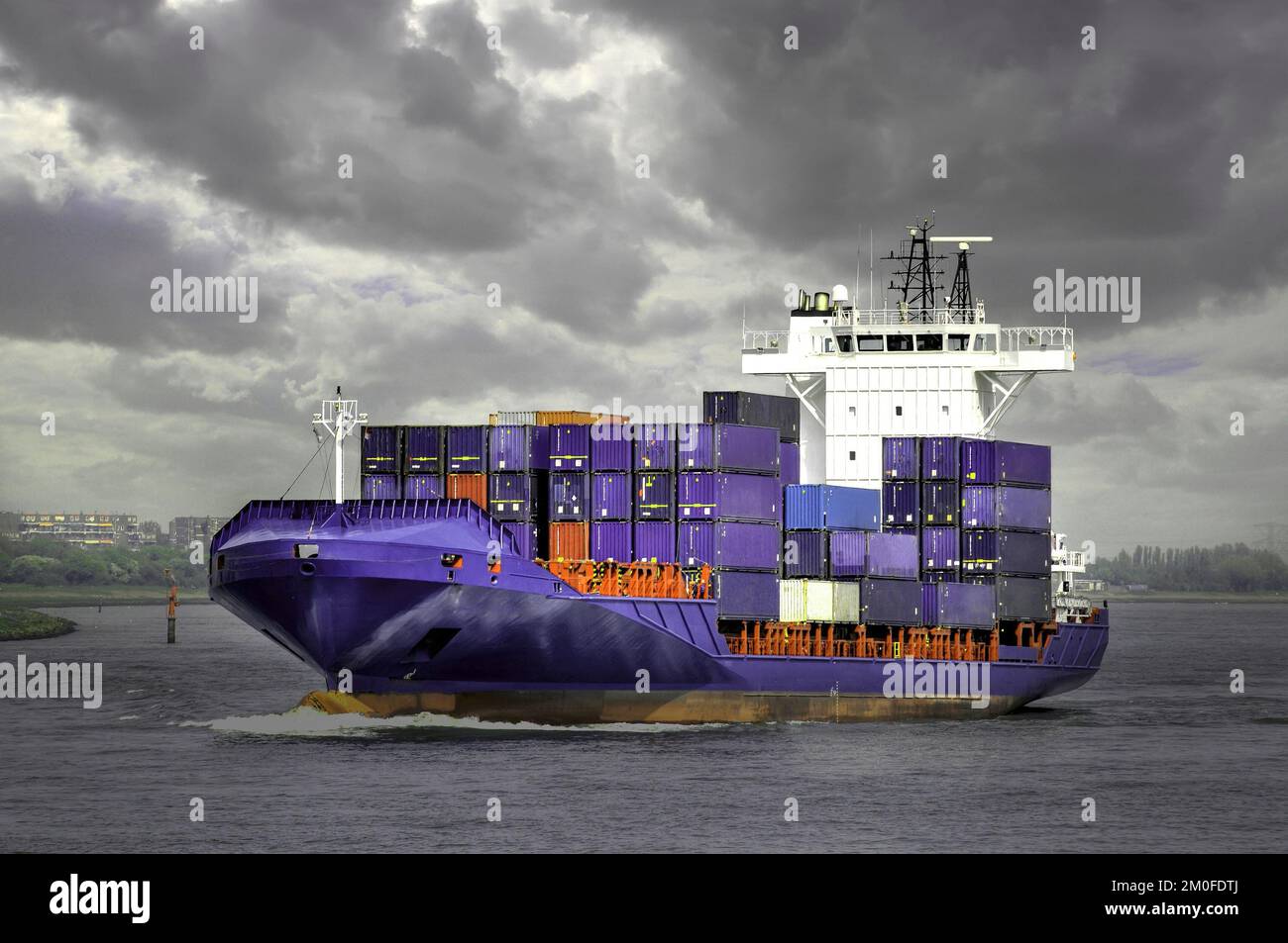 Loaded container ship at sea example Stock Photo - Alamy