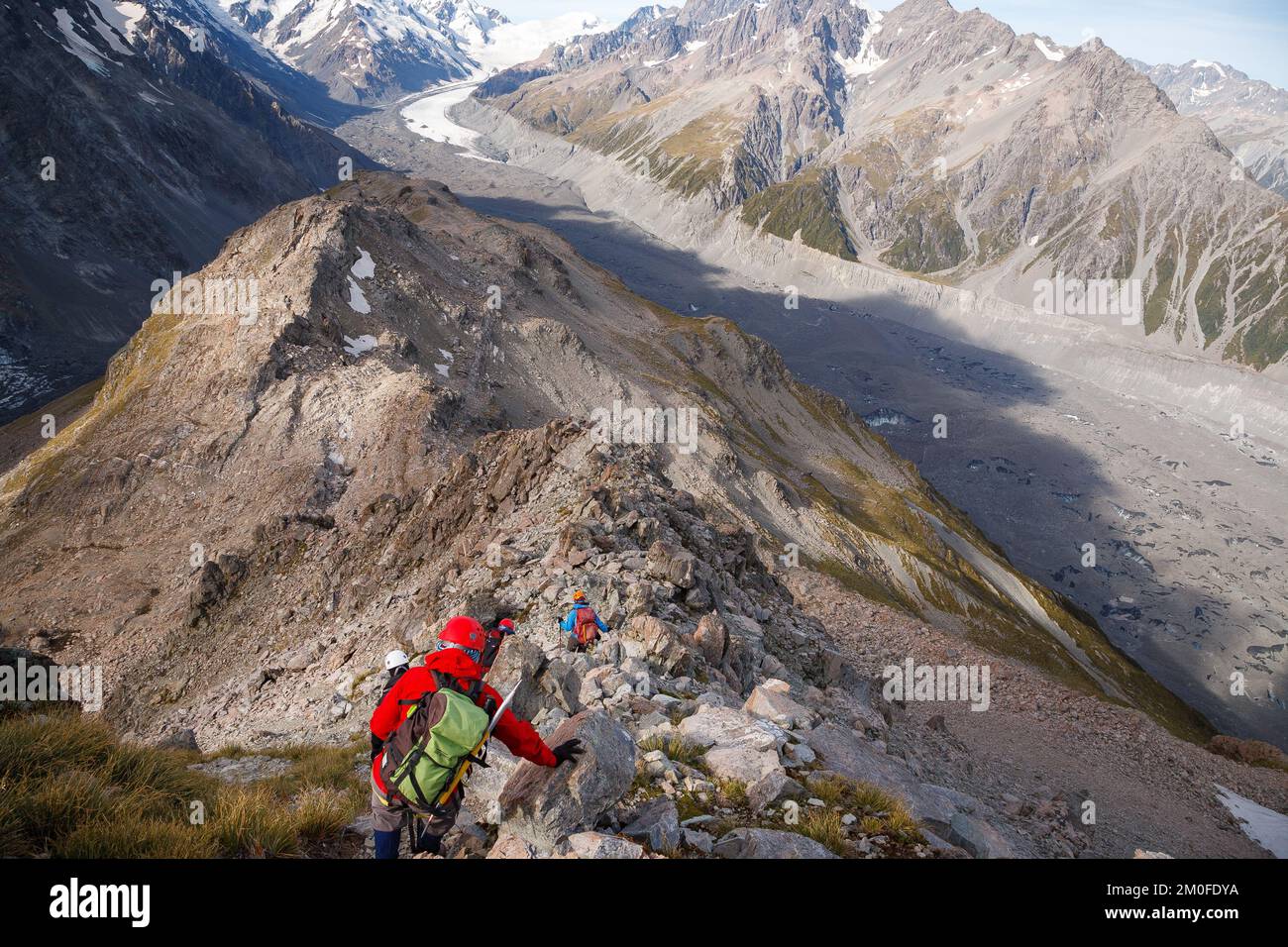 Hikers on Ball Pass guided Trek in Mount Cook New Zealand Stock Photo ...