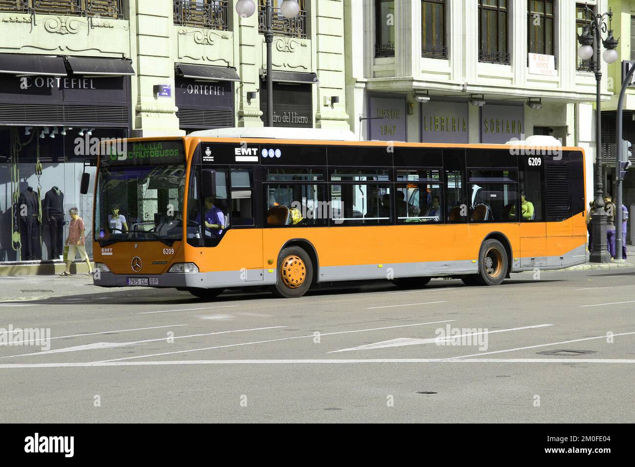 Single decker bus in a city center Stock Photo - Alamy