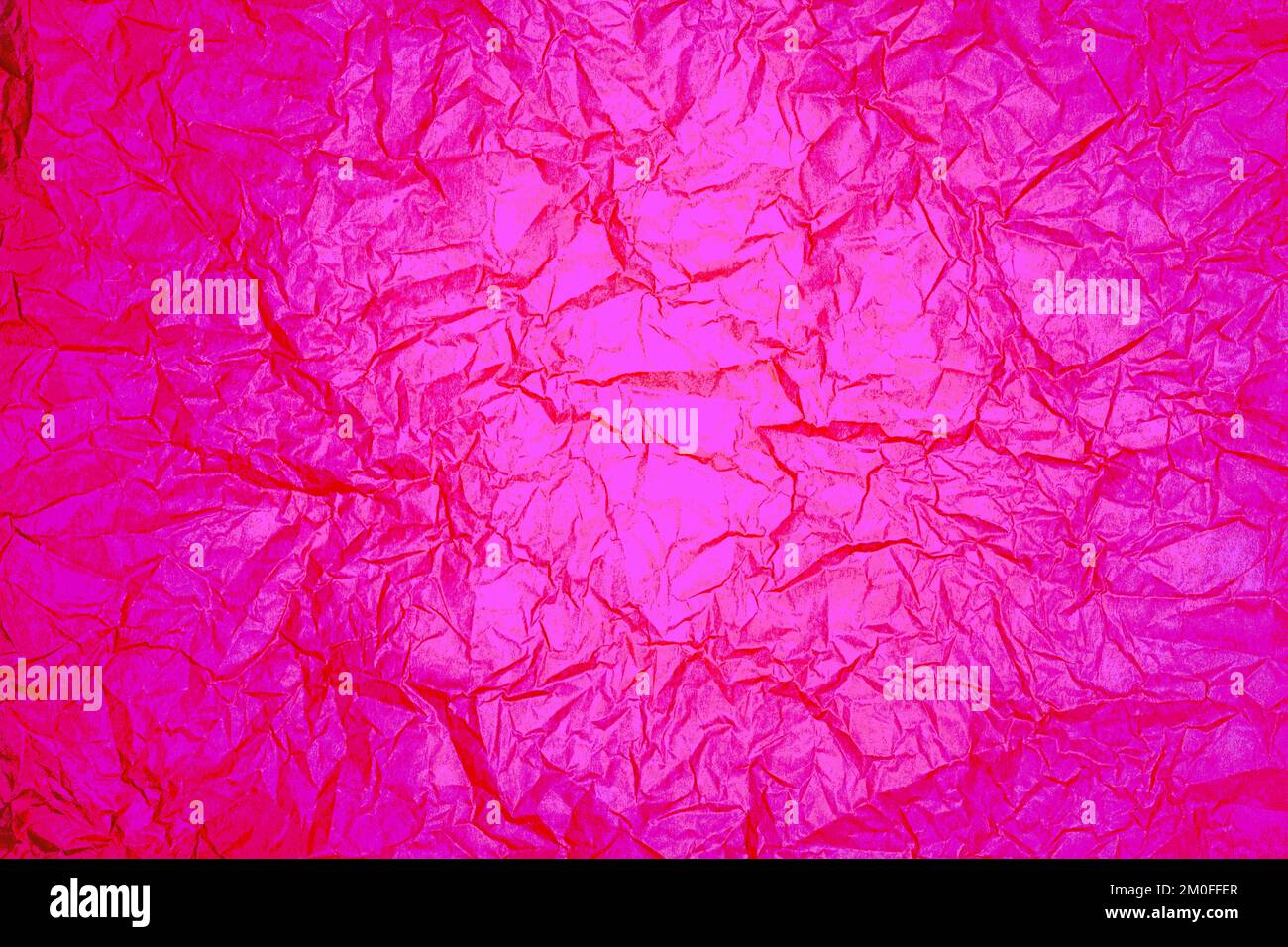 Pink crumpled paper texture background Stock Photo - Alamy