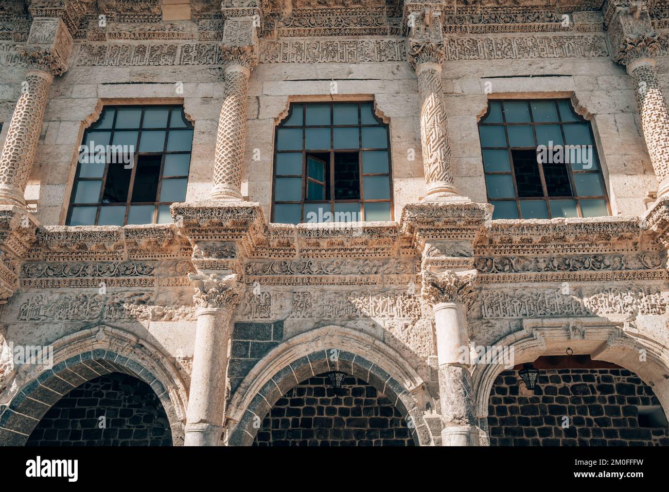 Facade of the Diyarbakir Grand mosque at sunrise, Turkey Stock Photo ...