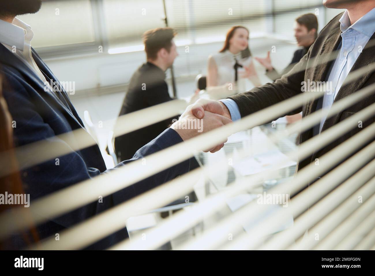 business people greeting each other in the office Stock Photo - Alamy