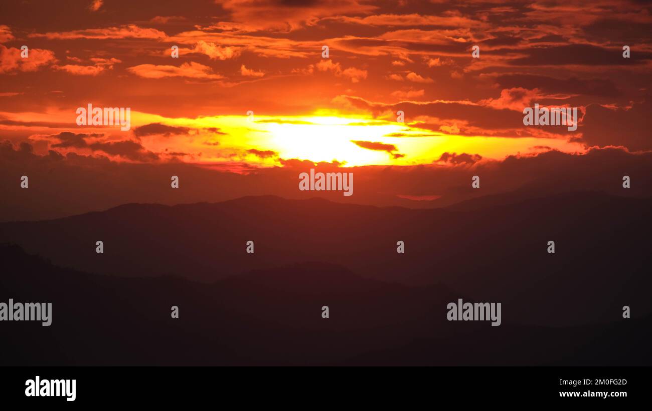 Time lapse of the beautiful sunset scenery on the top of the mountain ...