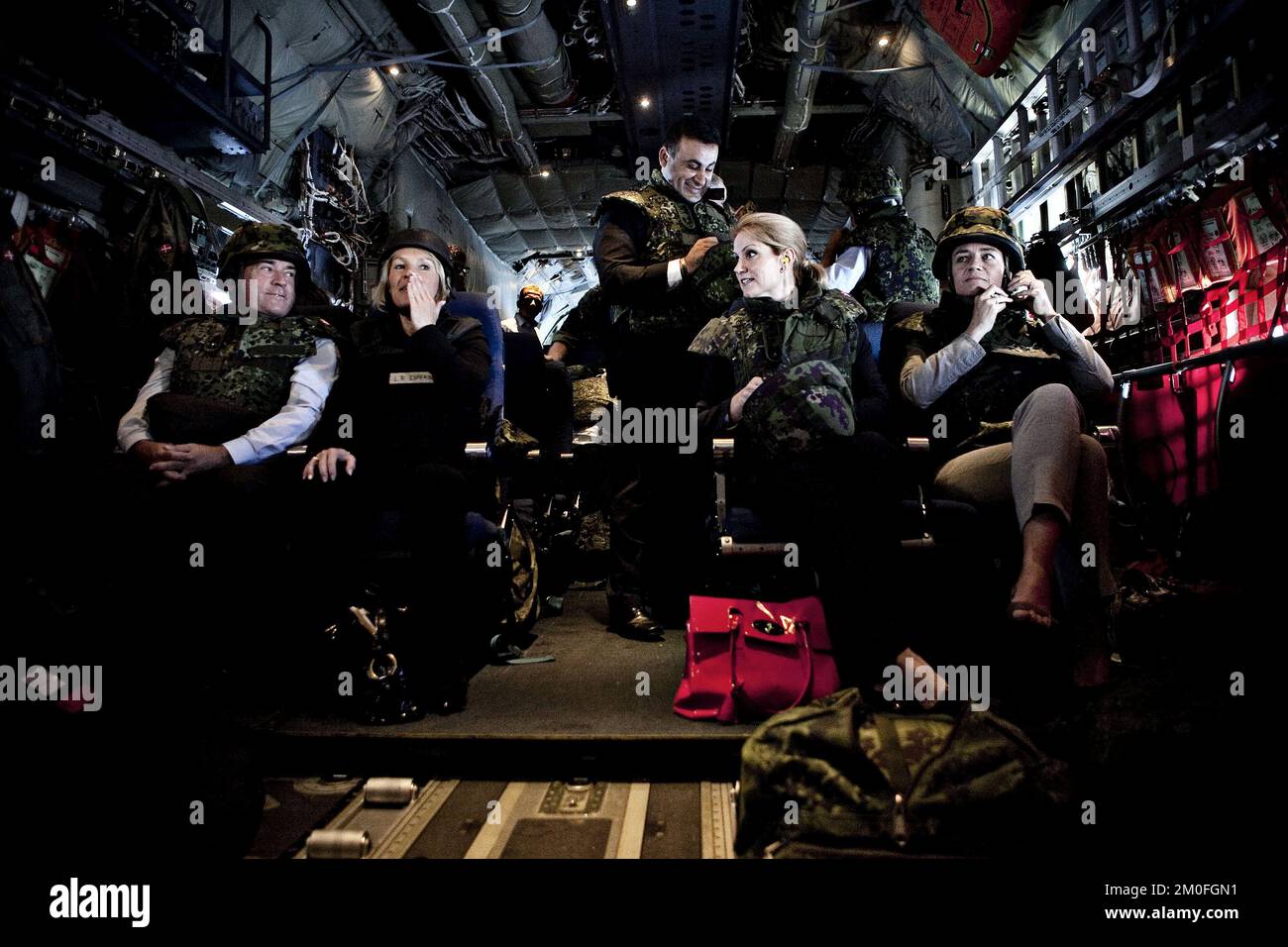 Helle Thorning-Schmidt with Danish politicians in a Hercules plane on ...