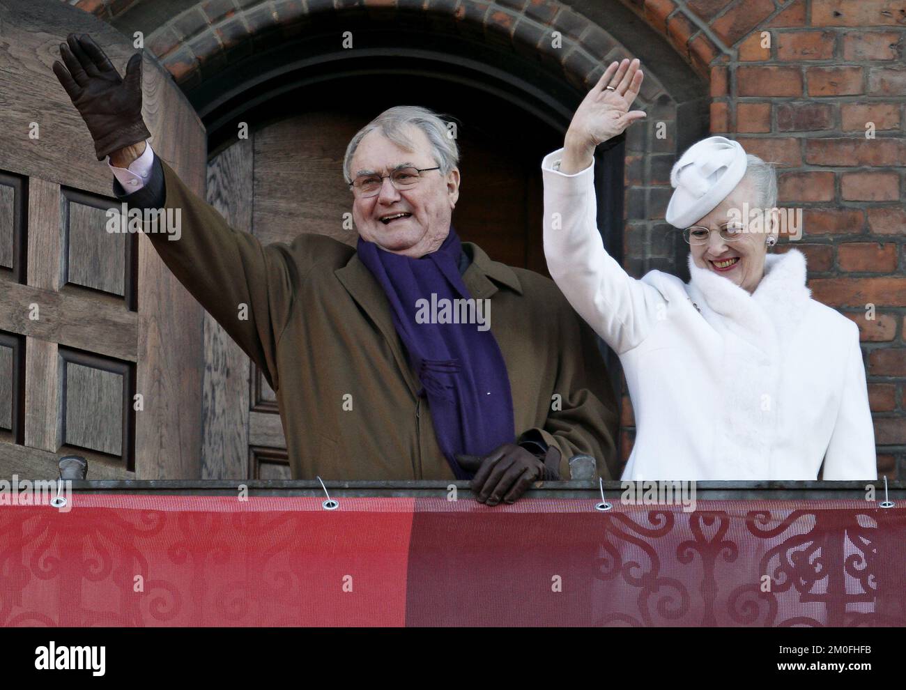 Tens of thousands of flag-waving Danes braved near-freezing ...
