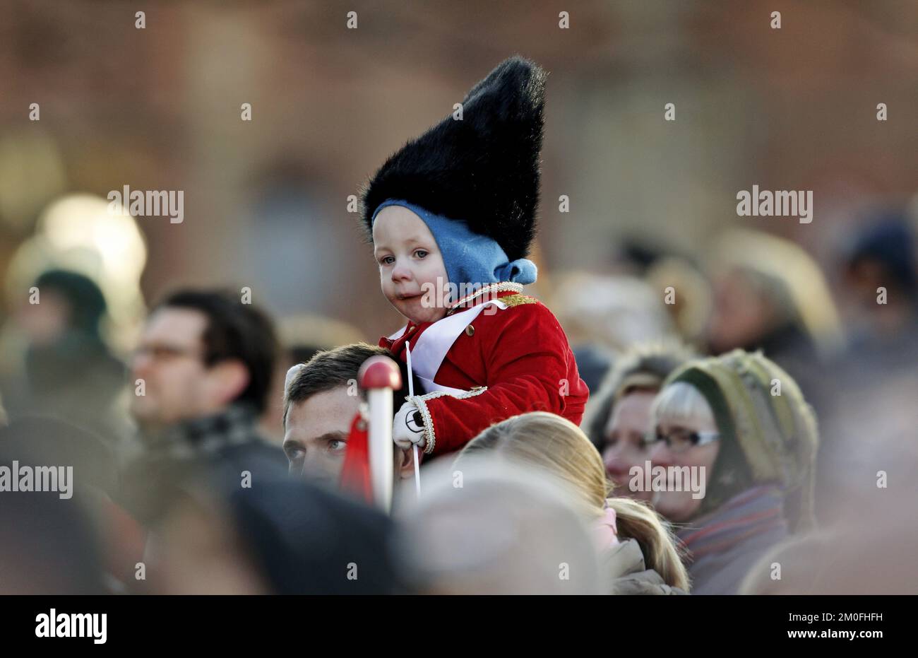 Tens of thousands of flag-waving Danes braved near-freezing ...