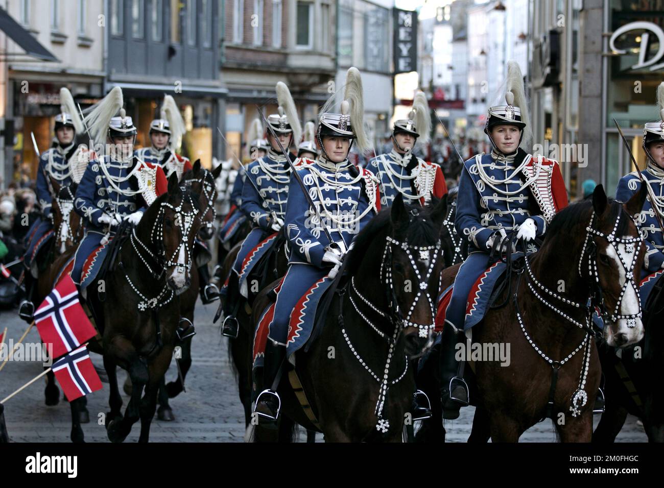 Tens of thousands of flag-waving Danes braved near-freezing ...
