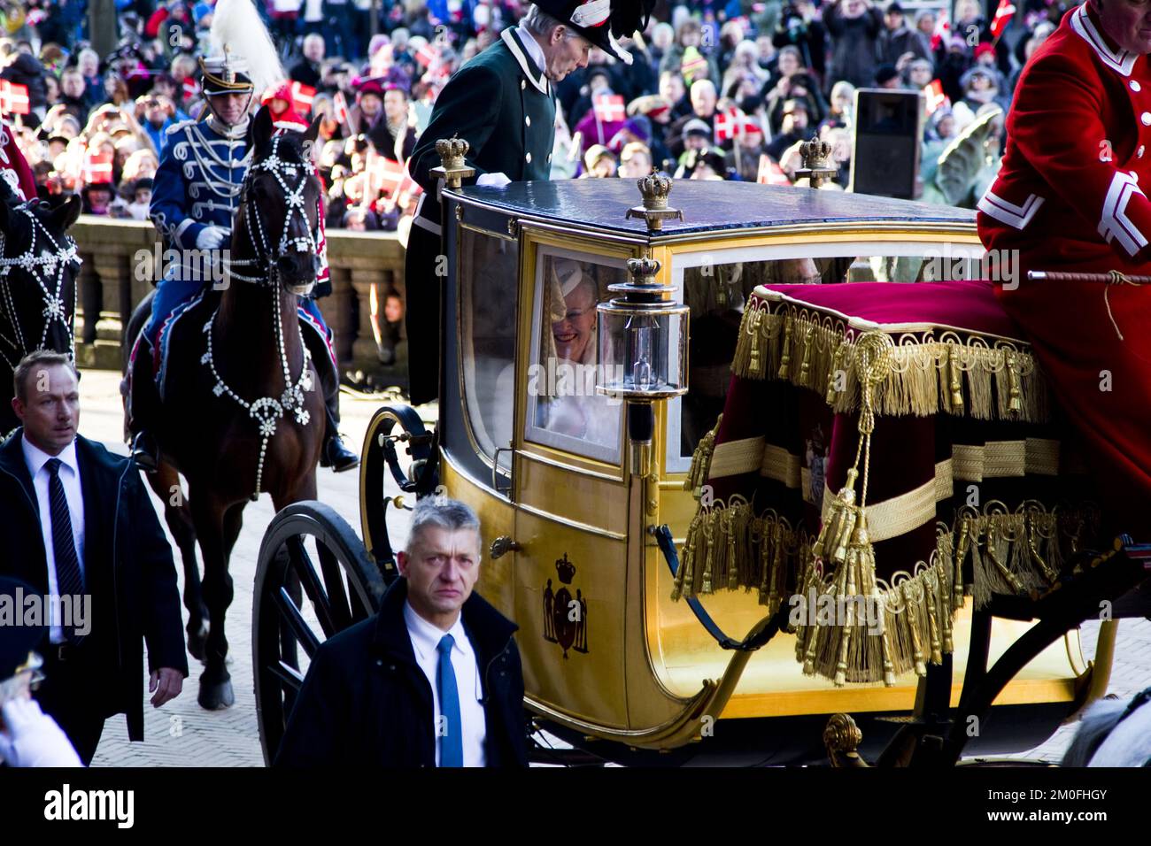 Tens of thousands of flag-waving Danes braved near-freezing ...