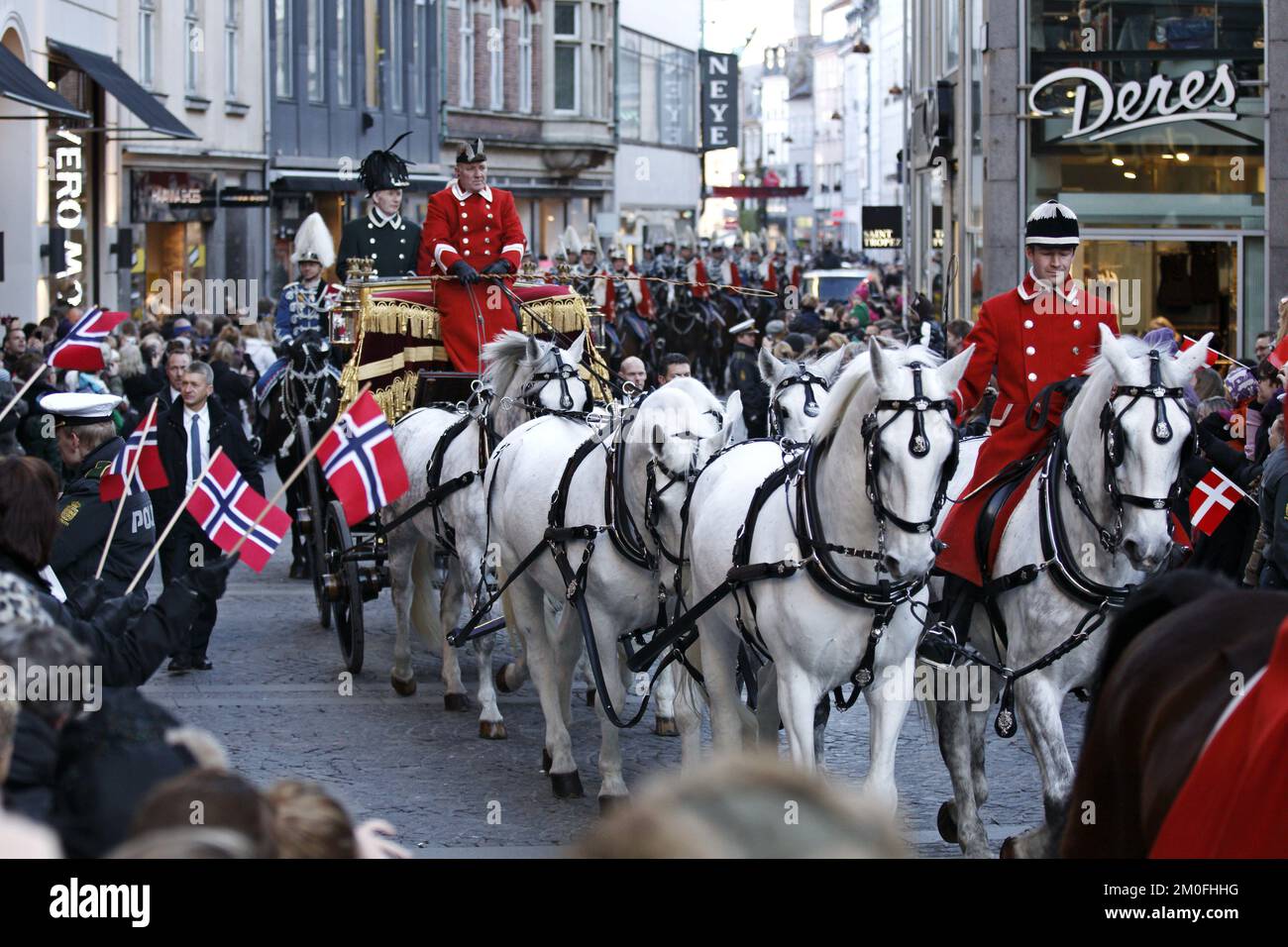 Tens of thousands of flag-waving Danes braved near-freezing ...