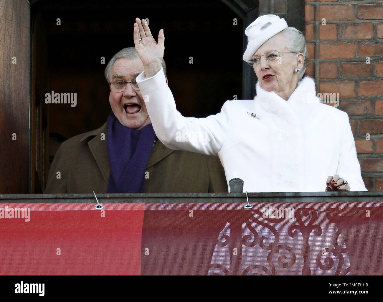 Tens of thousands of flag-waving Danes braved near-freezing ...