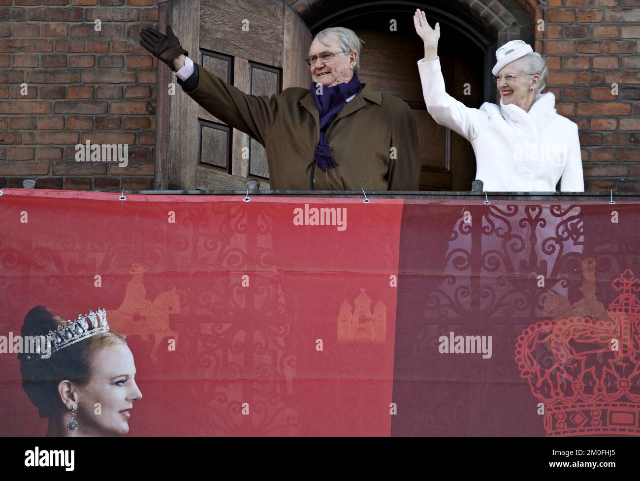 Tens of thousands of flag-waving Danes braved near-freezing ...