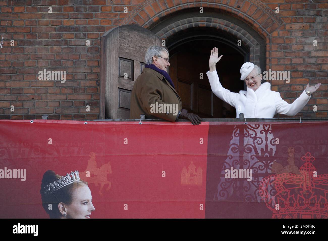 Tens of thousands of flag-waving Danes braved near-freezing ...