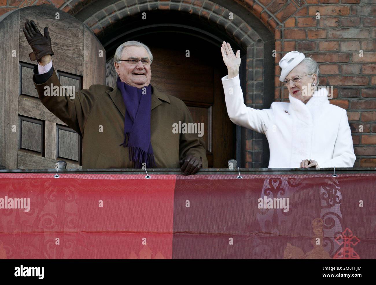 Tens of thousands of flag-waving Danes braved near-freezing ...