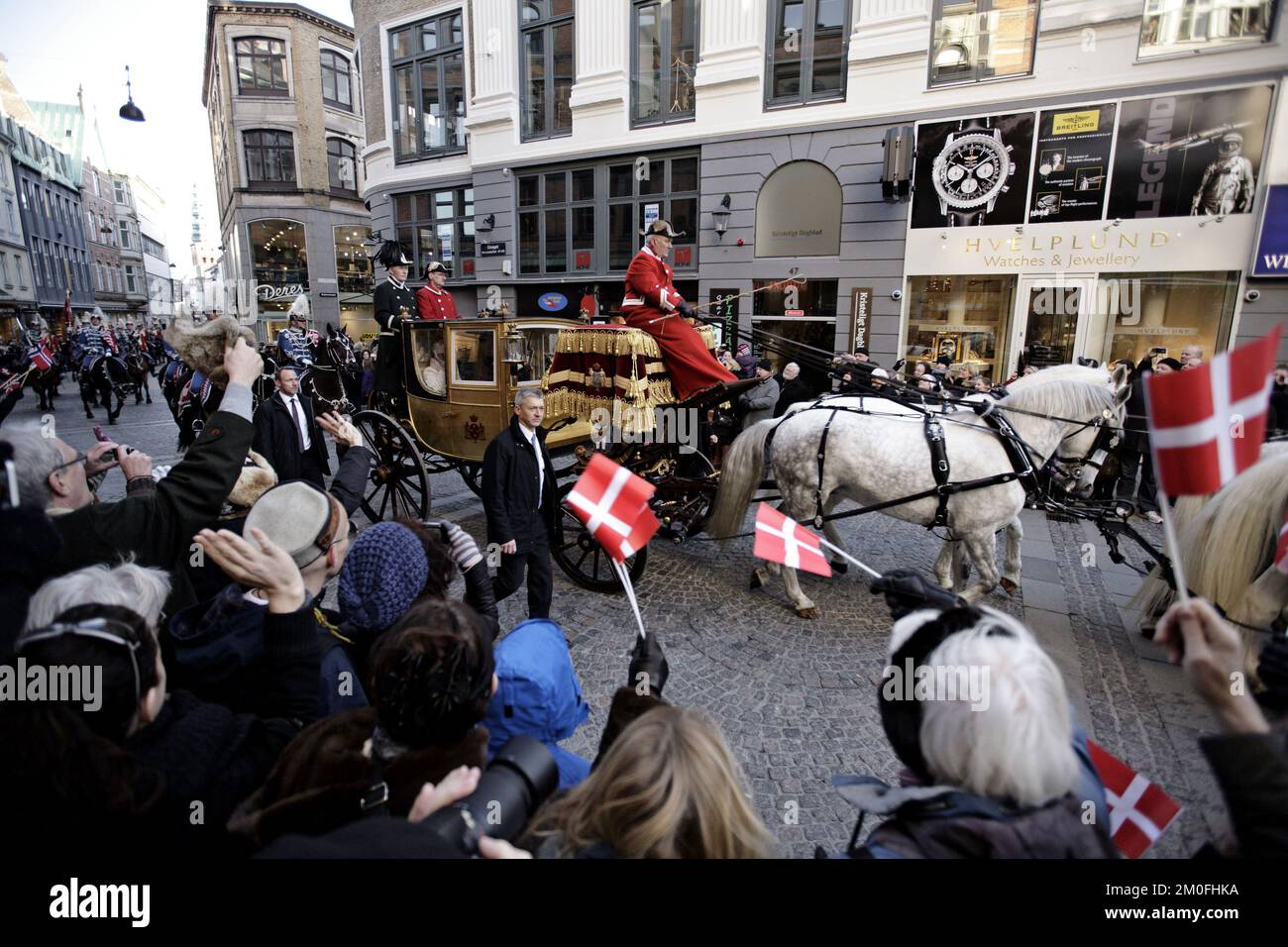Tens of thousands of flag-waving Danes braved near-freezing ...