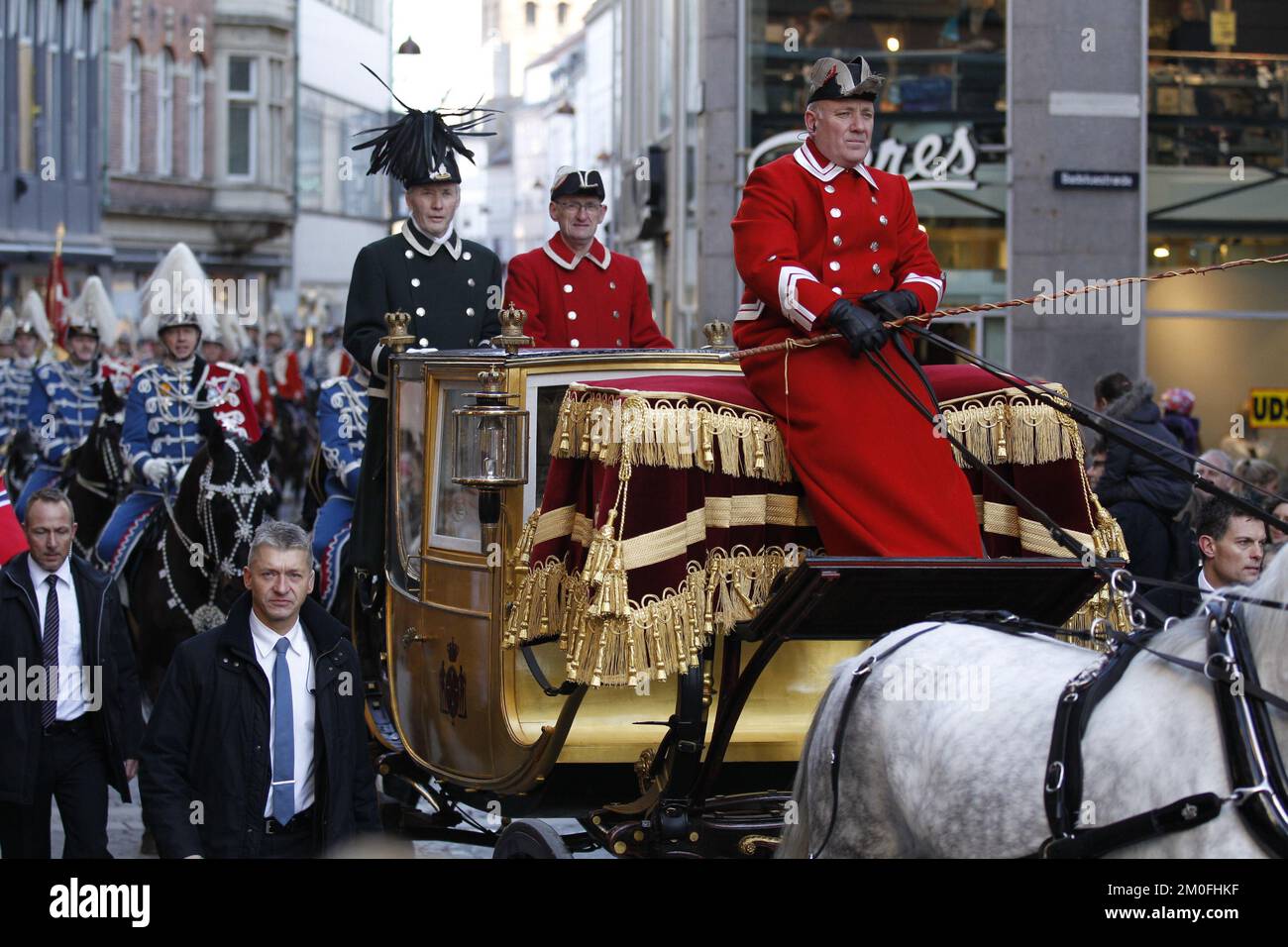 Tens of thousands of flag-waving Danes braved near-freezing ...