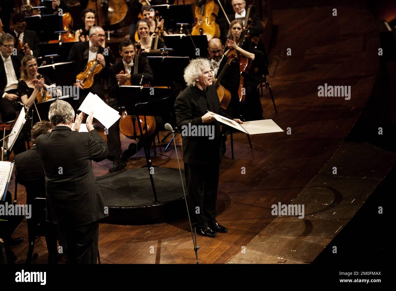 Berliner philharmonic british chief conductor hi-res stock photography ...