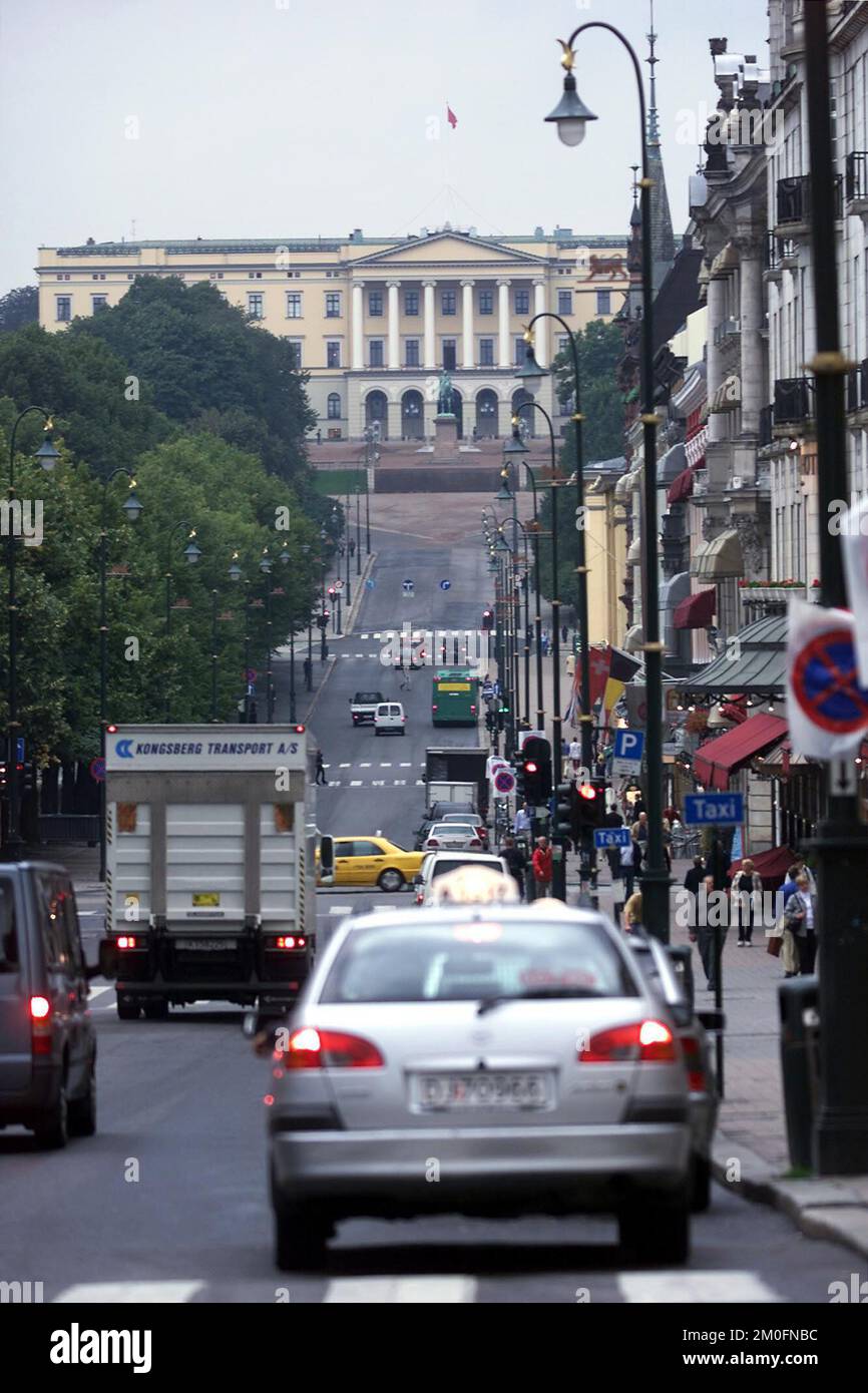 Cars driving in the main street of Oslo, Karl Johansgate. At the end of ...