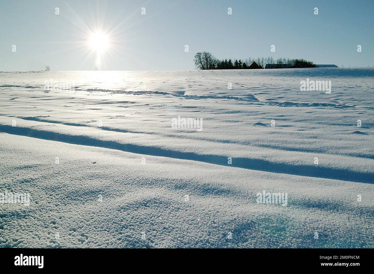 Easter in Denmark. The sun shining on the snow on the fields of Denmark ...