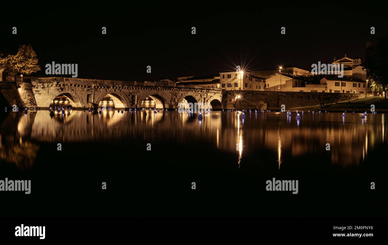 On the picture we can see Tiberius Bridge in Rimini. Captured at night ...