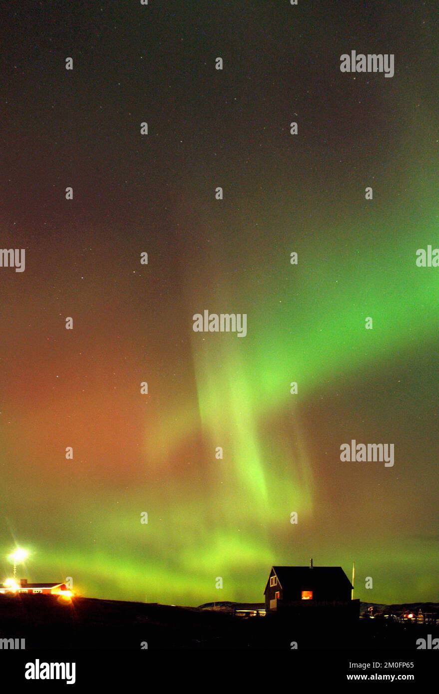 Northern lights (aurora borealis) seen on the sky around midnight in ...