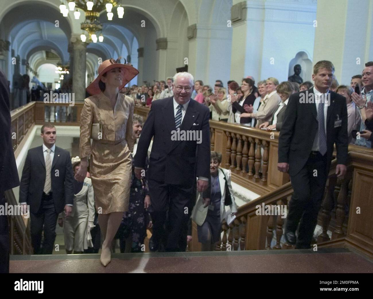 Miss Mary Donaldson and the Danish politician Mr. Kaj Ikast arrive for ...