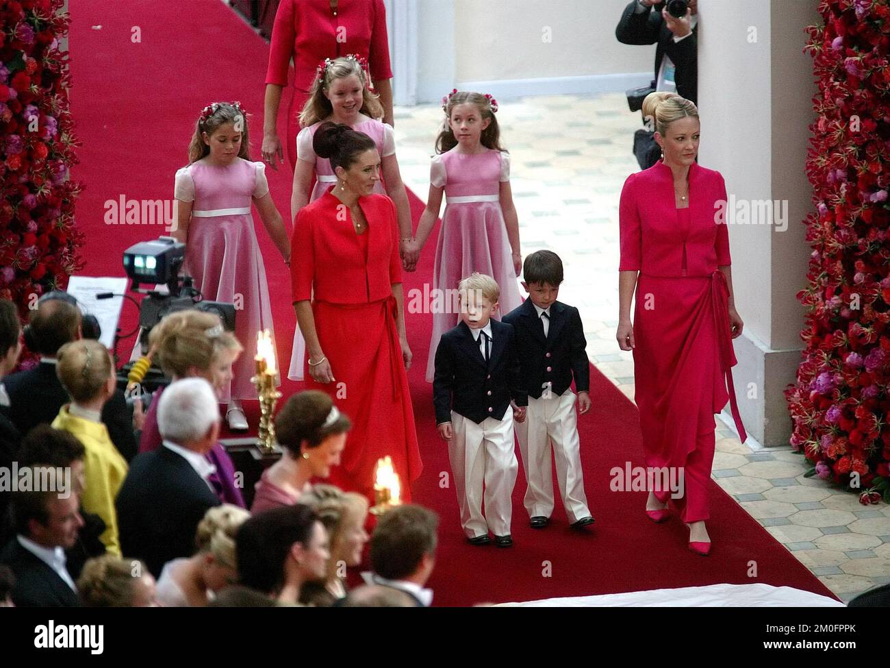 Sisters of the bride, Miss Amber Petty and Jane Stephens (red dress ...