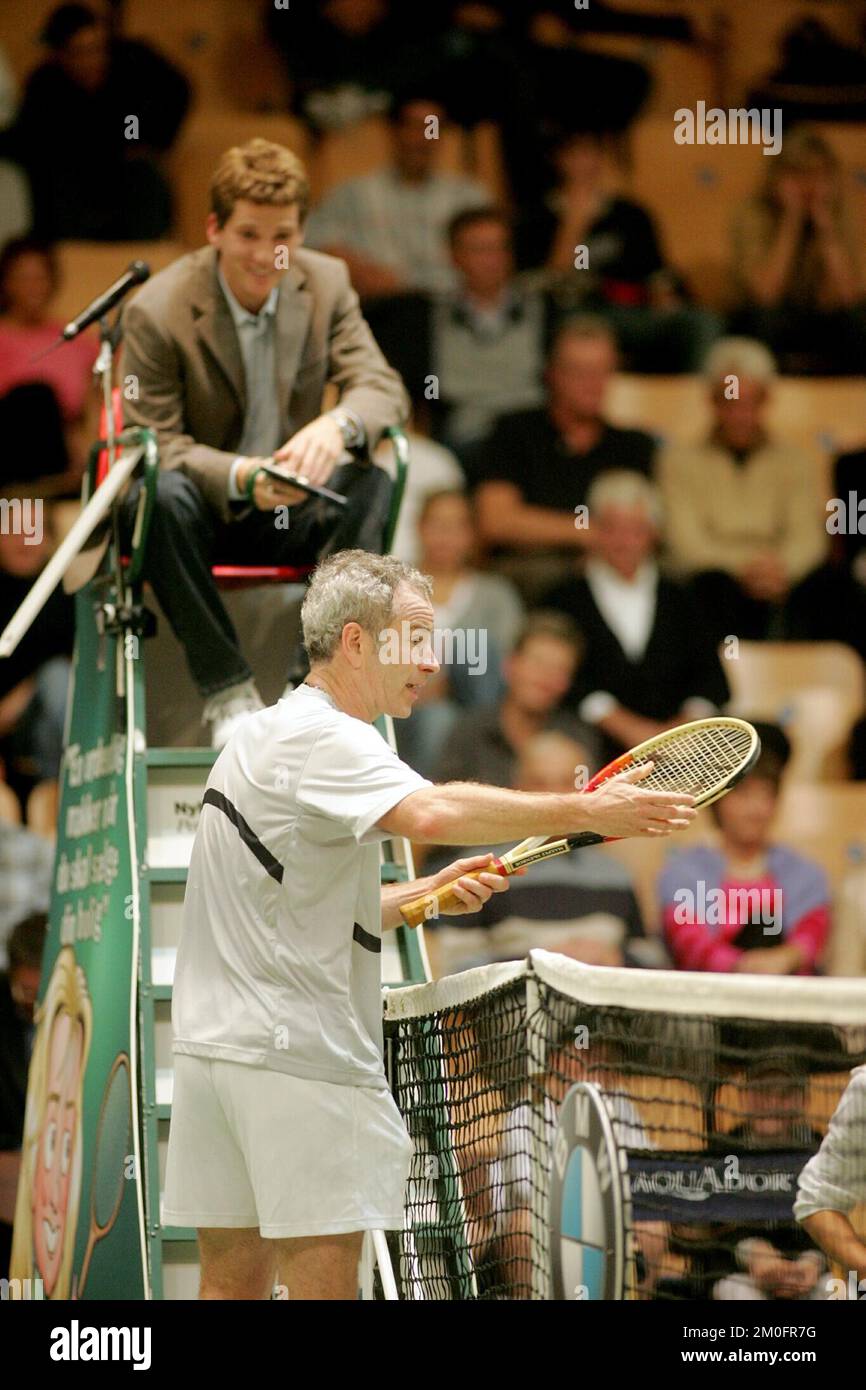 American John McEnroe in action against frenchman Henri Leconte during ...